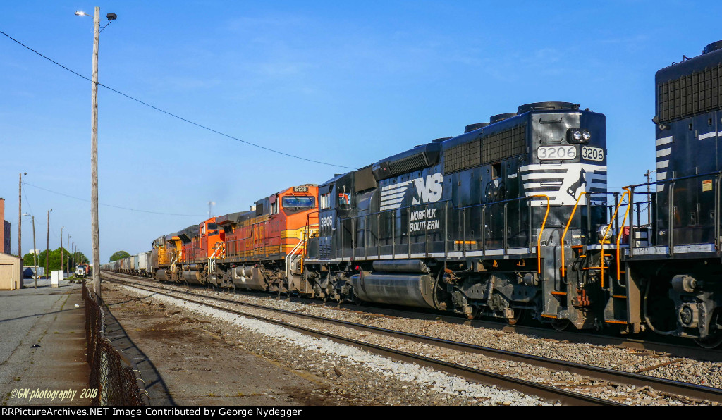 A freight train passing thru the NS Pomona Yard